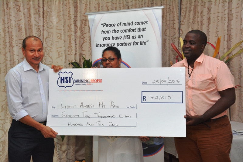 H. Savy Insurance donates cheque to NGO -Archive -Seychelles Nation