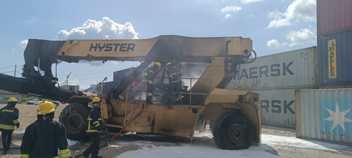 Fire destroys part of a container reach stacker -Seychelles Nation
